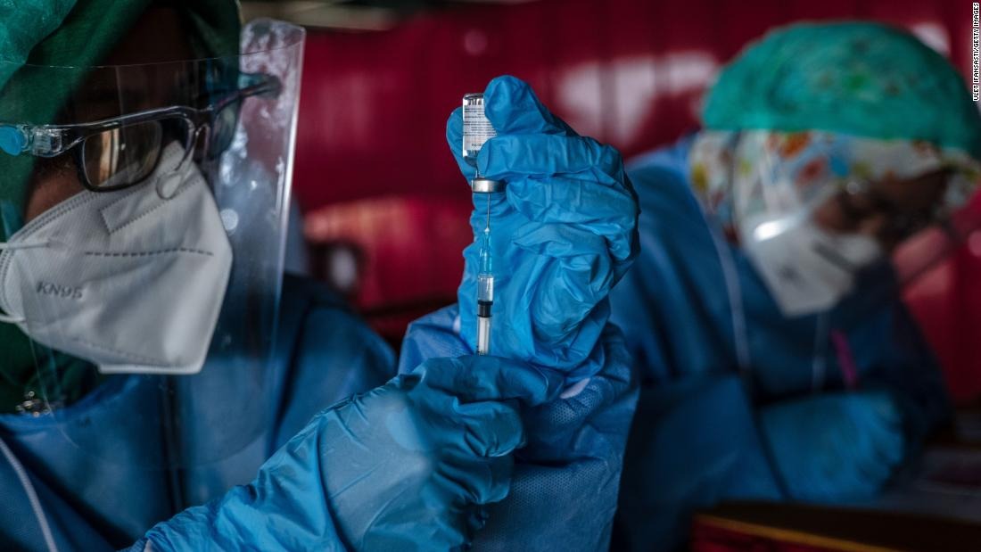 China opens its borders to foreigners who take Chinese shots, as ...